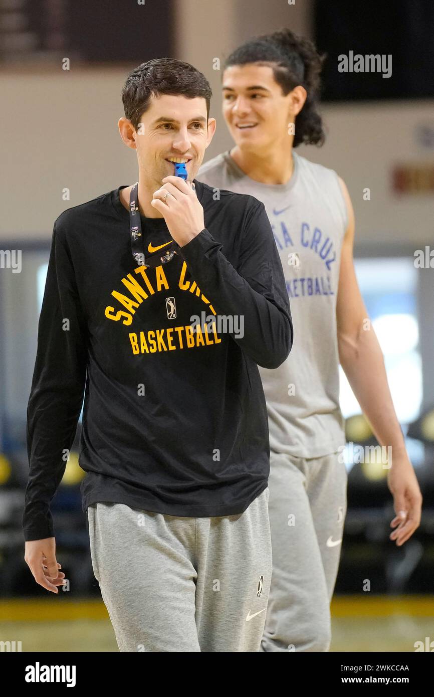 Santa Cruz Warriors coach Nicholas Kerr, foreground, walks on the court ...