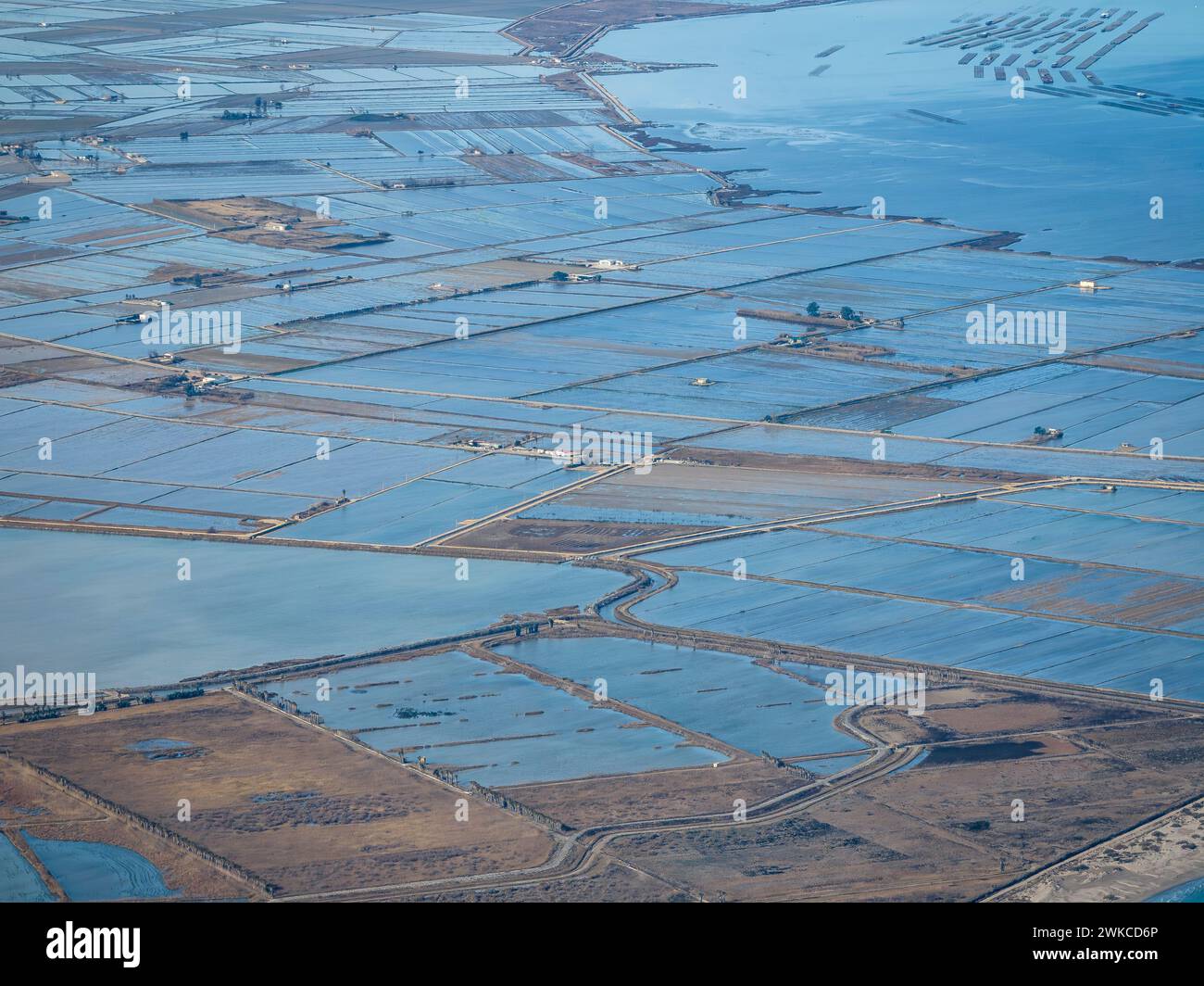 Aerial view of rice fields flooded with water in the Ebro Delta in ...