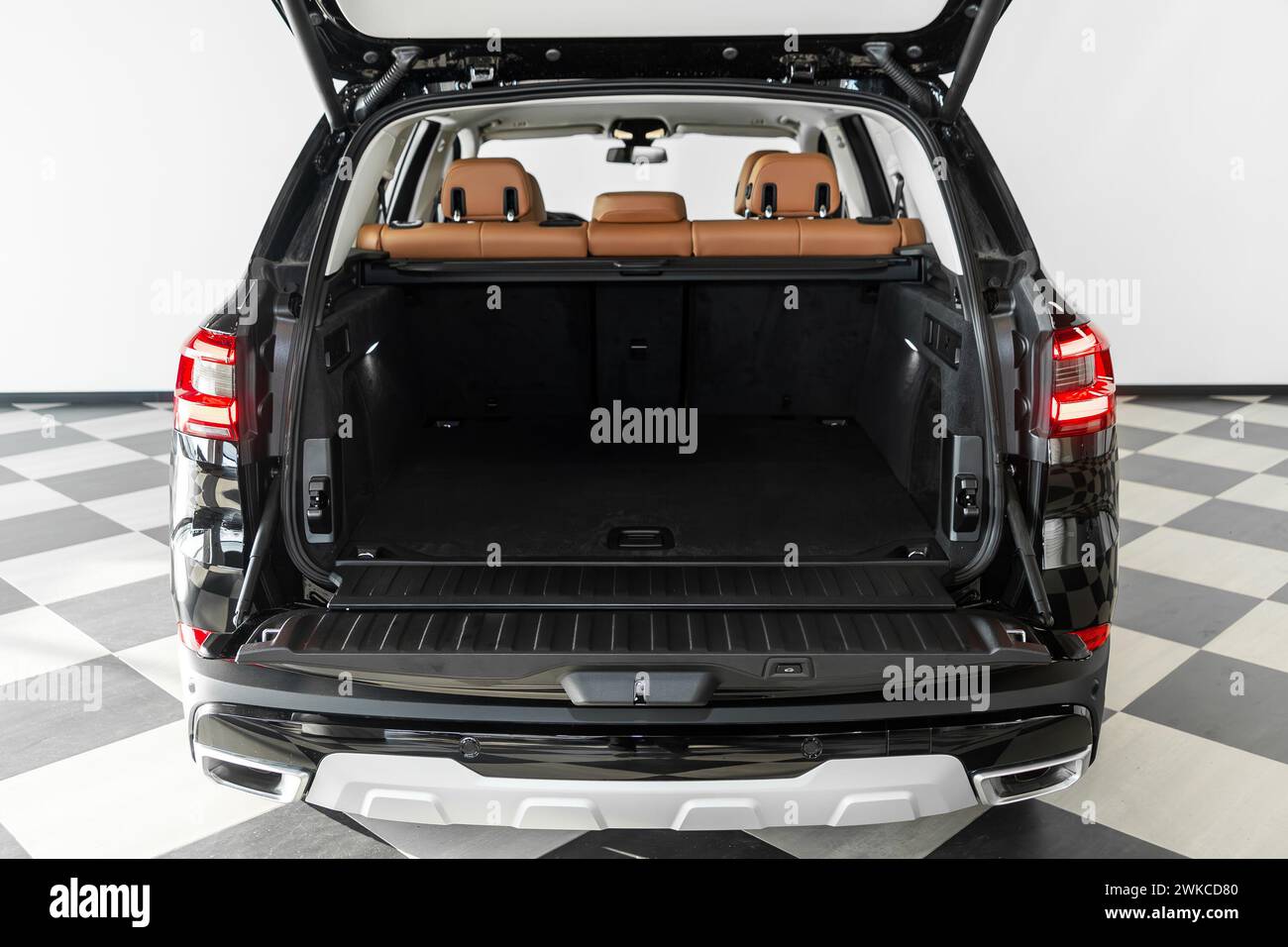 Clean, open empty trunk in the black car SUV in parking Stock Photo - Alamy