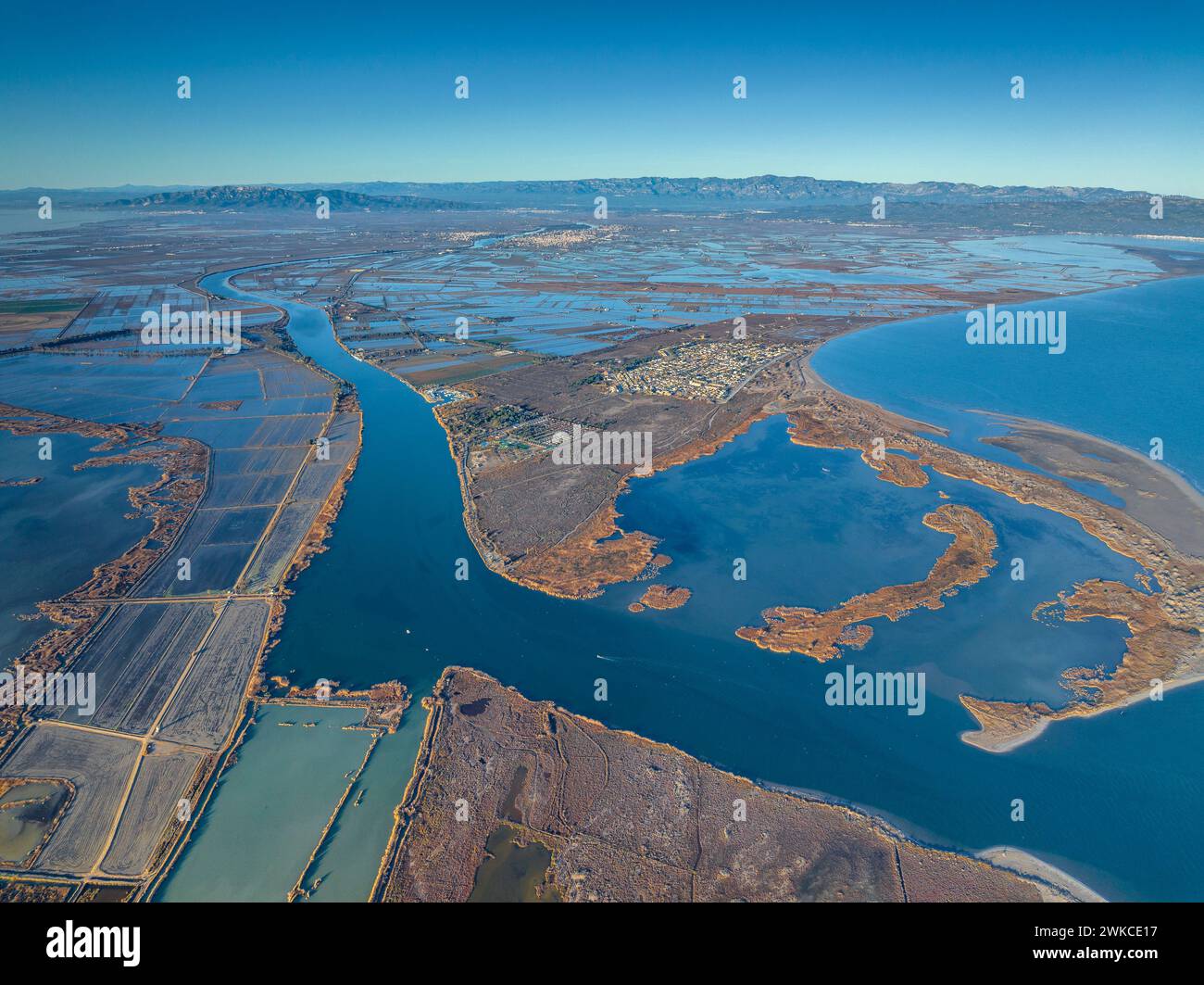 Sunrise over the mouth of the Ebro River in the Ebro Delta. Aerial view ...