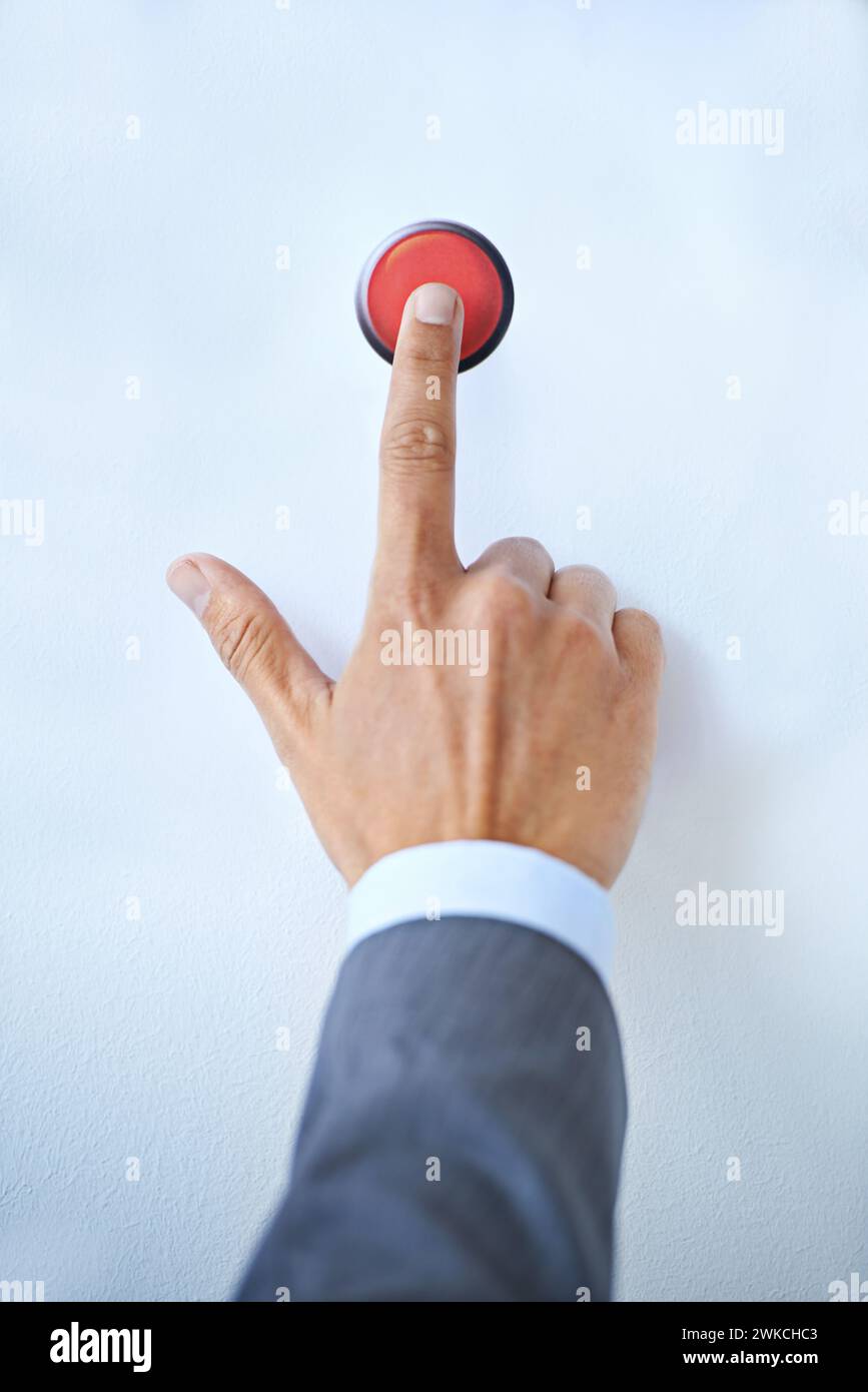 Businessman, hands and red button for war, nuclear launch or initiation ...