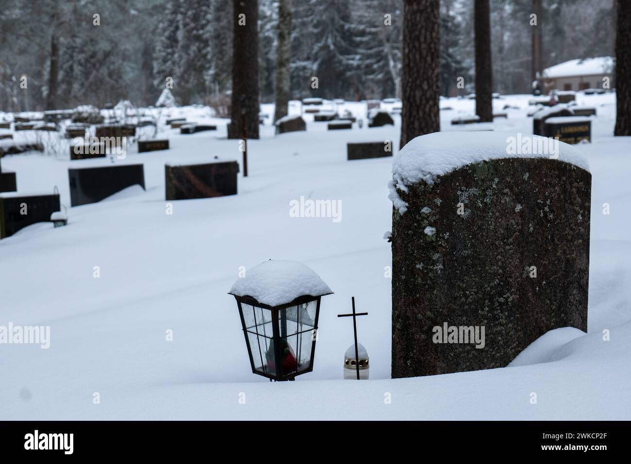 Grave stones in snow hi-res stock photography and images - Alamy