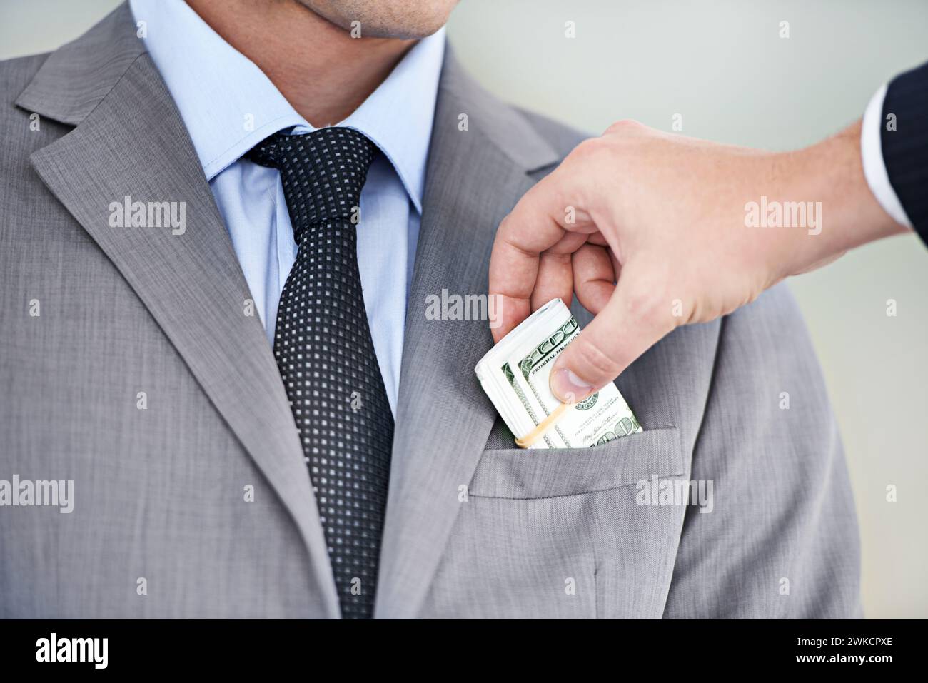 Businessman, hands and bribe with cash for fraud, payment or deal on a ...