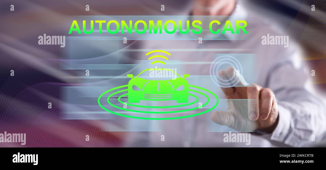 Man touching an autonomous car concept on a touch screen with his ...