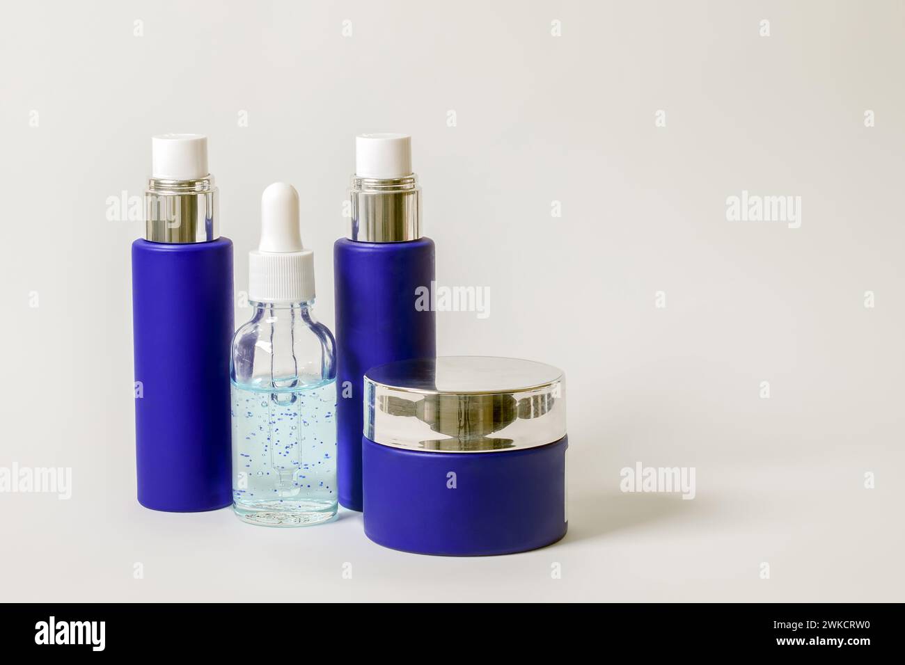 Set of colorful cosmetics - serums, jars, bottles, skincare and face ...