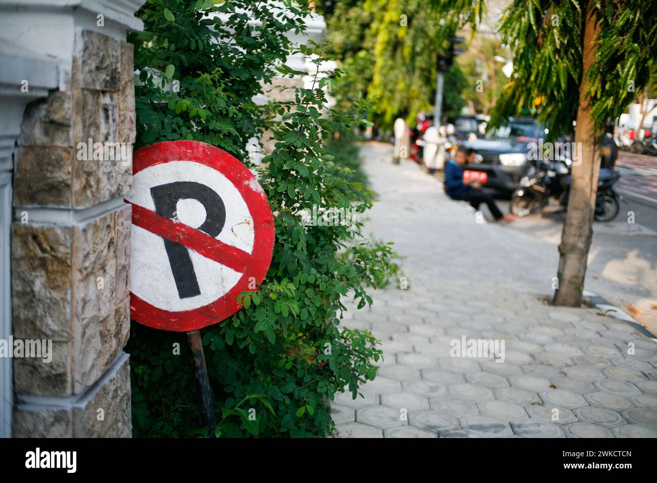 Rusty road sign no parking in the side street in Kediri, East Java ...