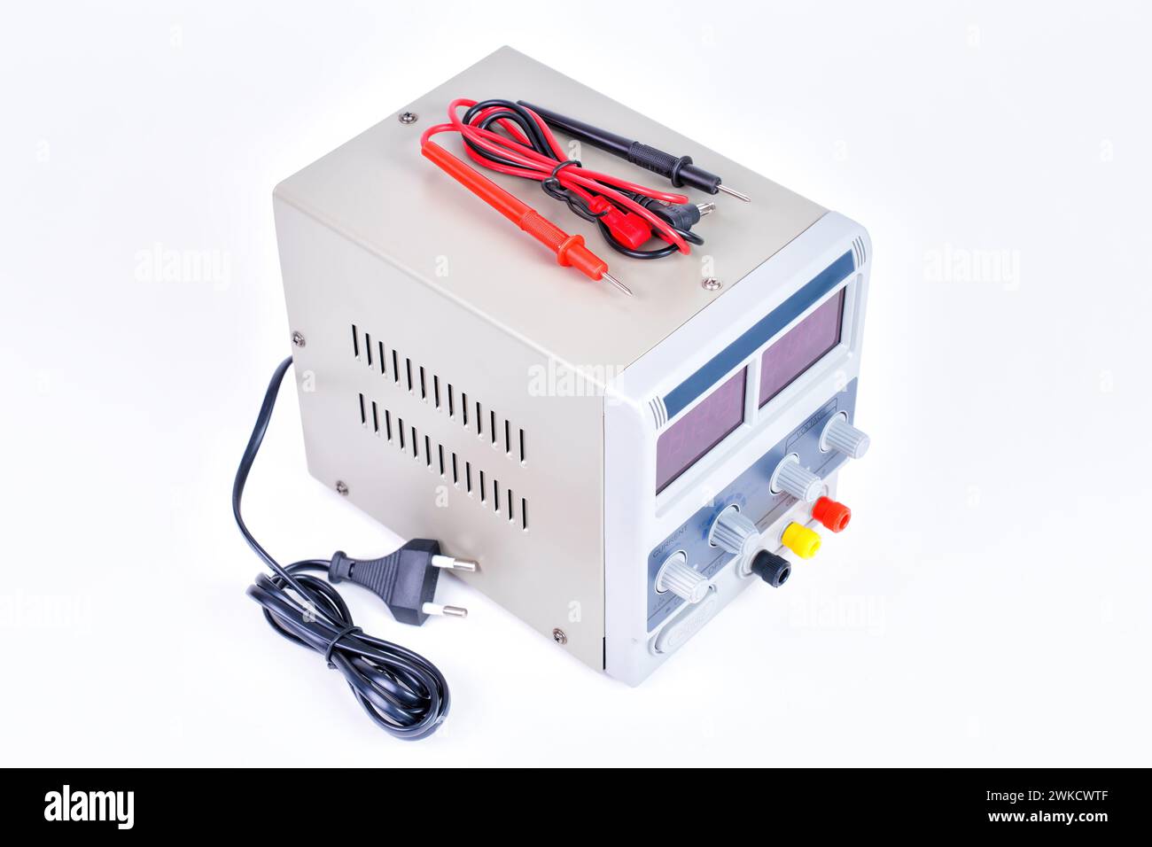 Top-side view of a lab DC power supply unit with Leads and wires ...
