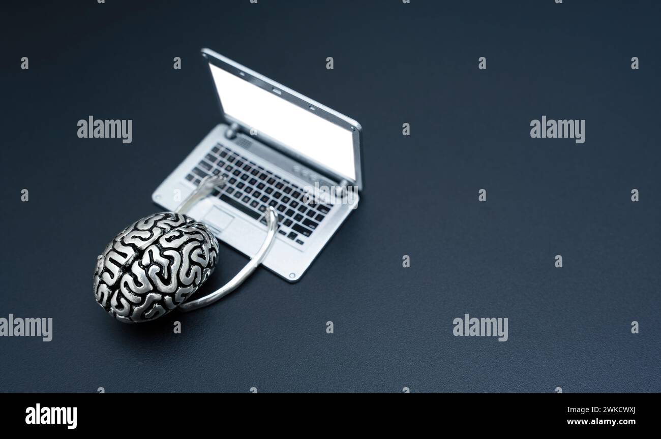 Steel brain model with cute hands actively engaged in working on a ...