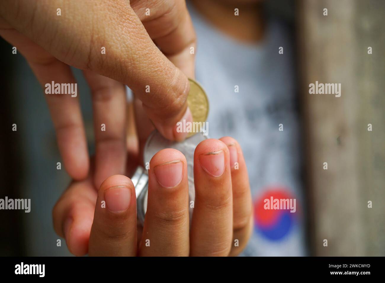 Stock photo of someone who is making a monetary donation Stock Photo ...