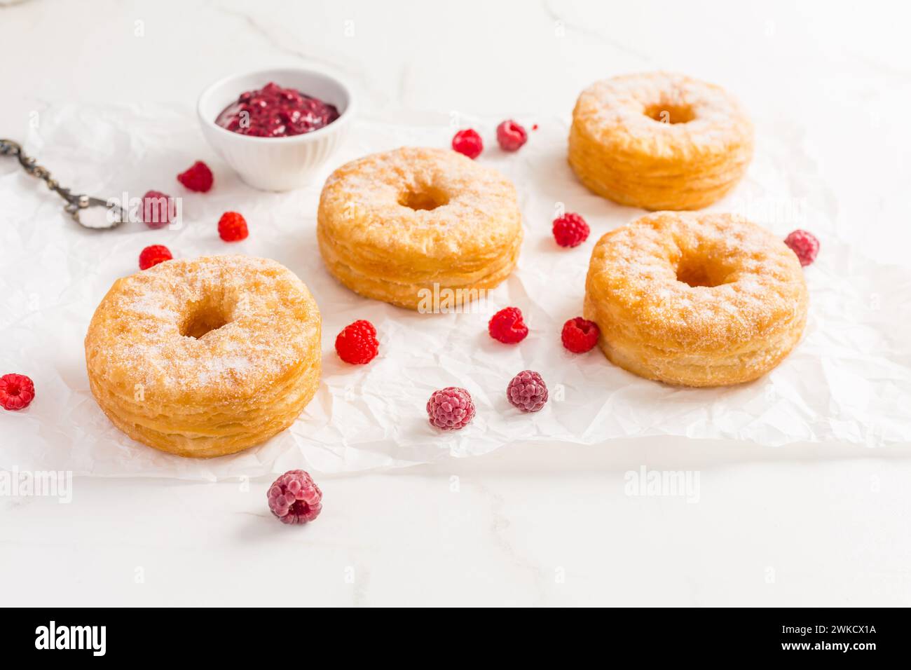 Cronuts - delicious fusion of croissant and donut with raspberry jam ...