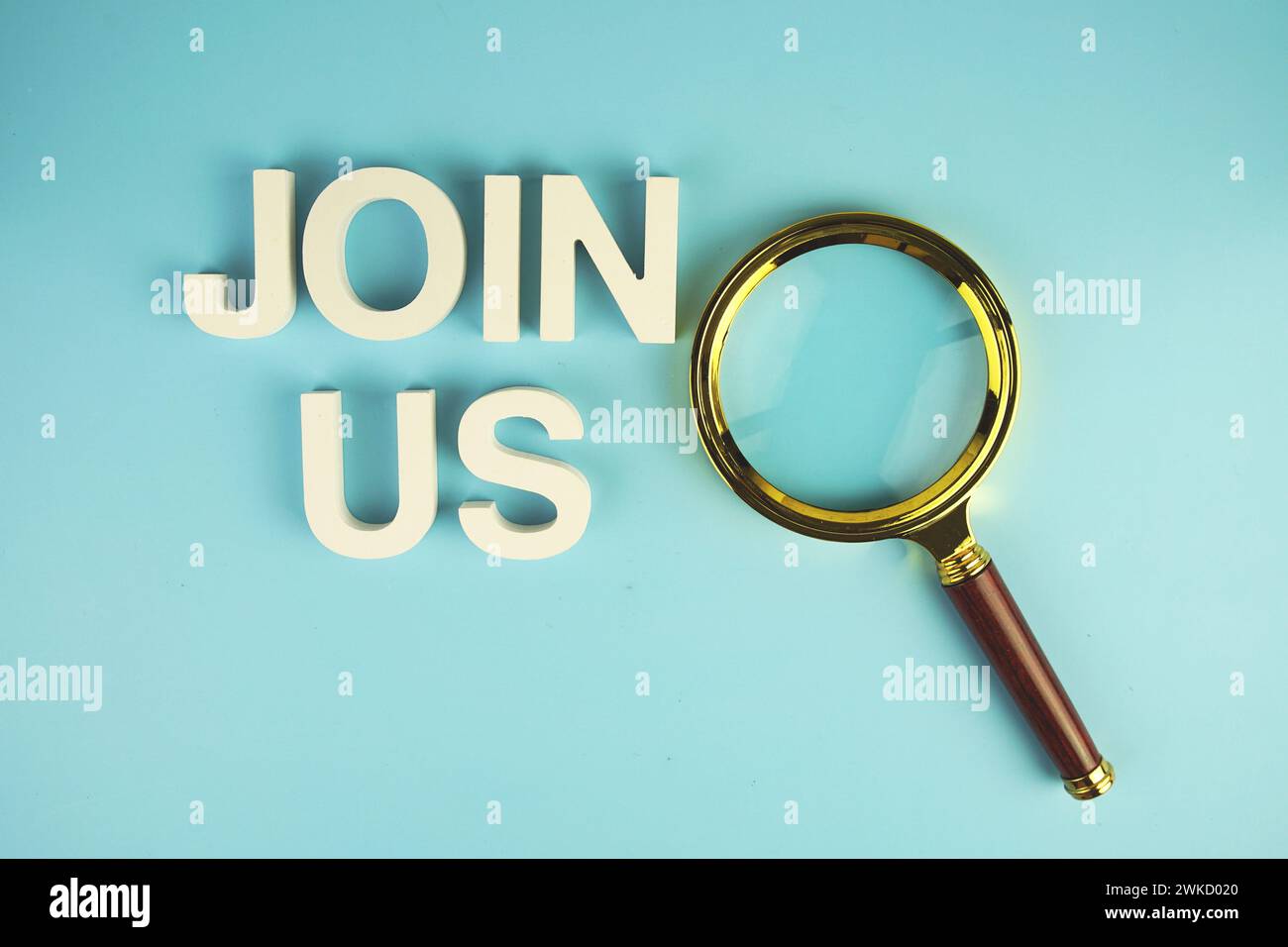 Join Us alphabet letters with magnifying glass on blue background Stock ...