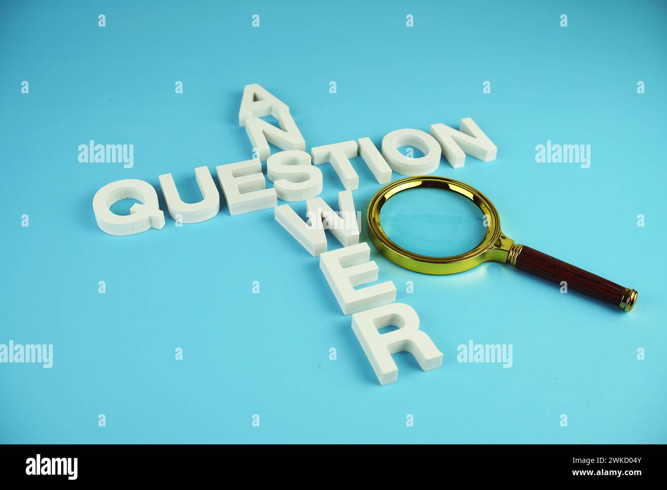 Question and Answer alphabet letters with magnifying glass on blue ...