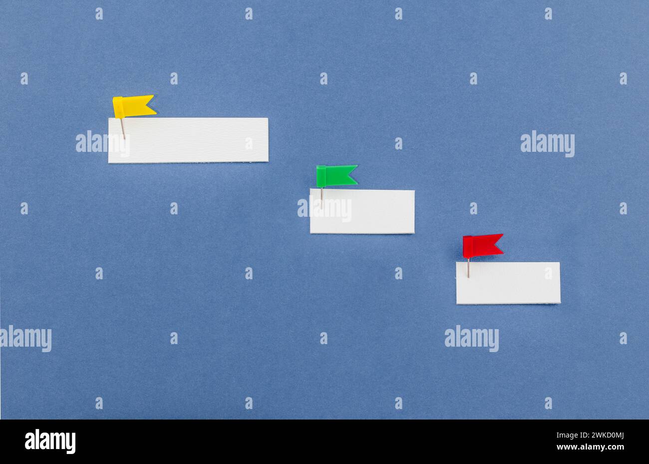 Blank paper notes are pinned to board. Business management and business ... Blank paper notes are pinned to board. Business management and business ...