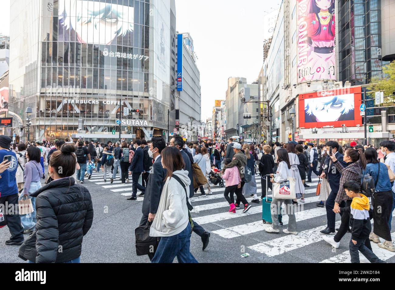 Shibuya Scramble crossing at Shibuya rail station, crowds at the ...