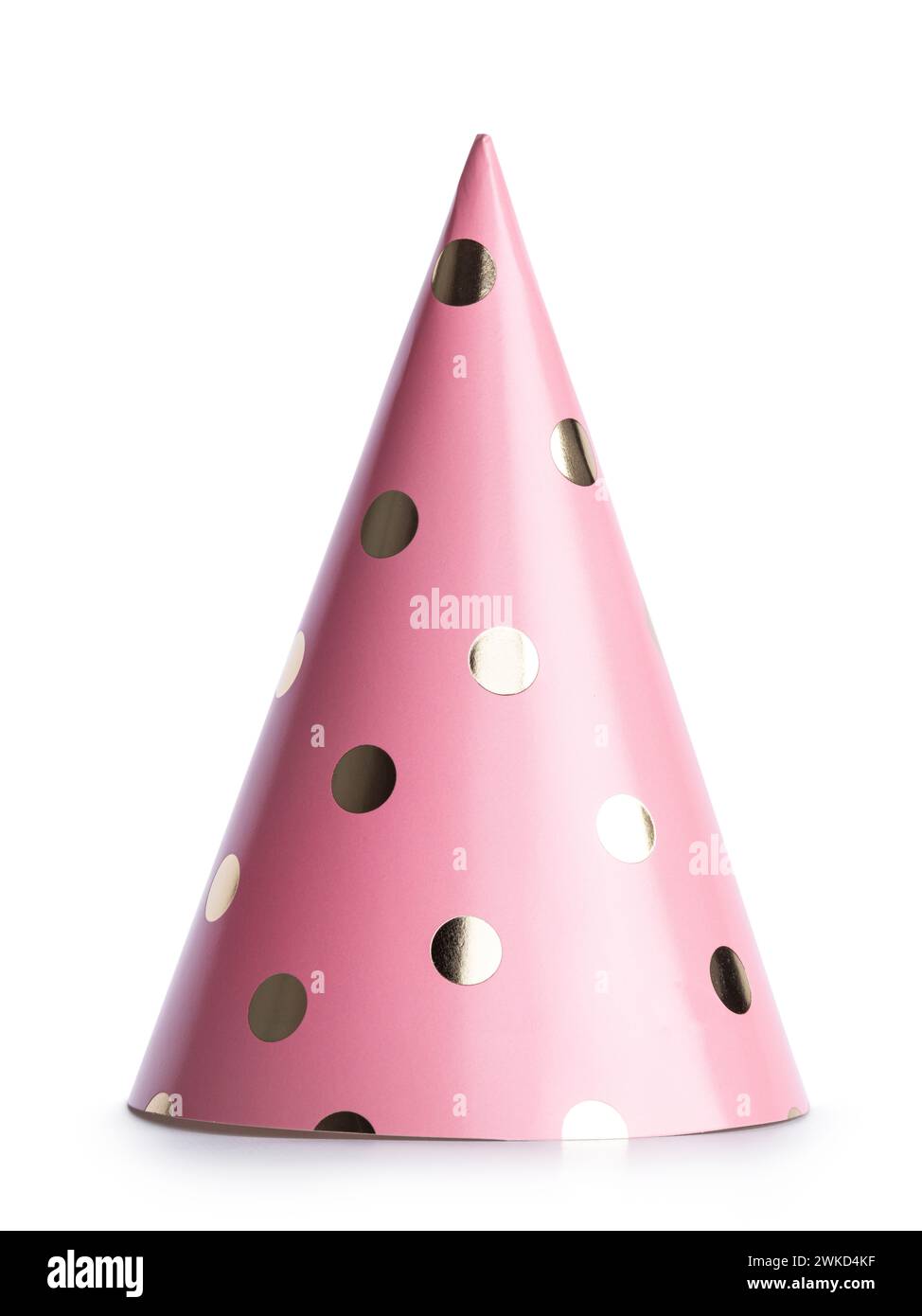 Pink paper party hat with golden shiny dot design, standing on solid ...