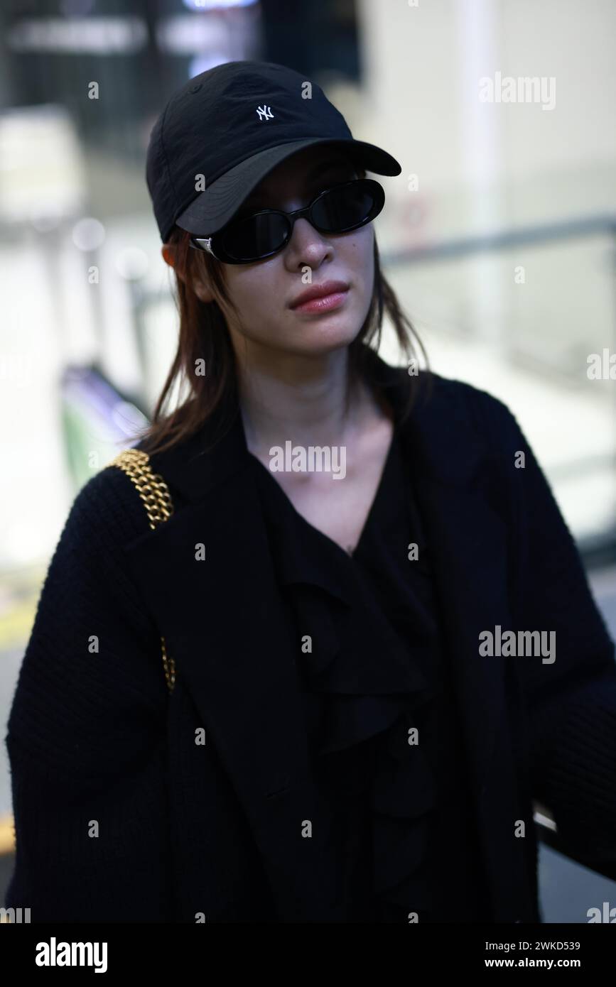 Chinese actress Zhong Chuxi appears at the airport in Shanghai, China ...