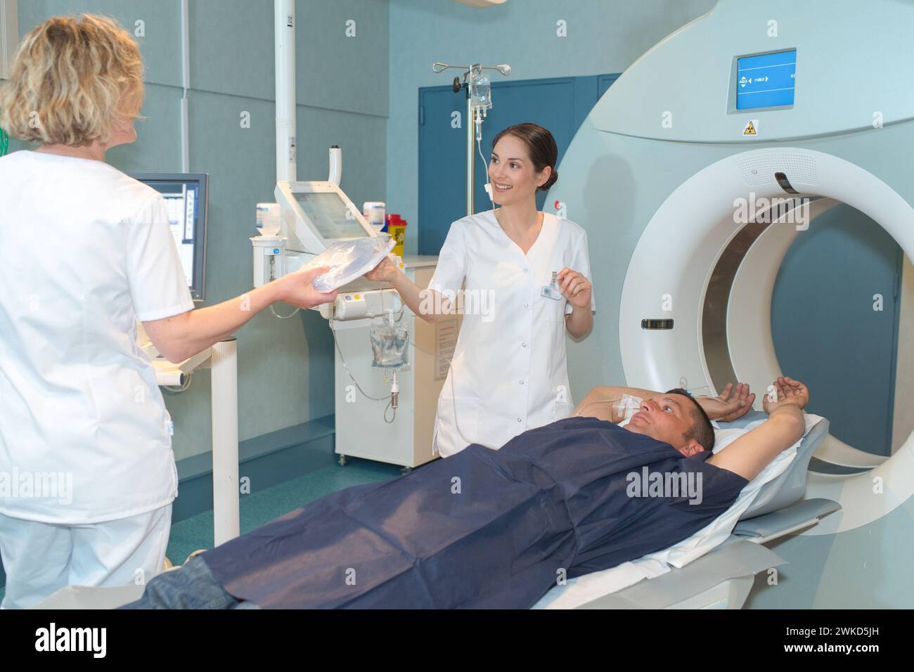 man in 40s ready to undergo mri scan Stock Photo - Alamy