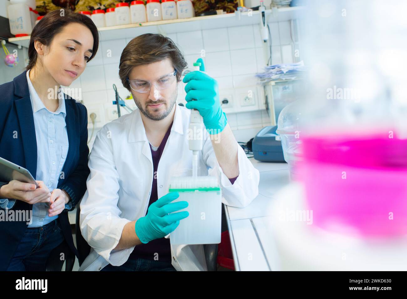 Serious scientists working in hi-res stock photography and images - Alamy