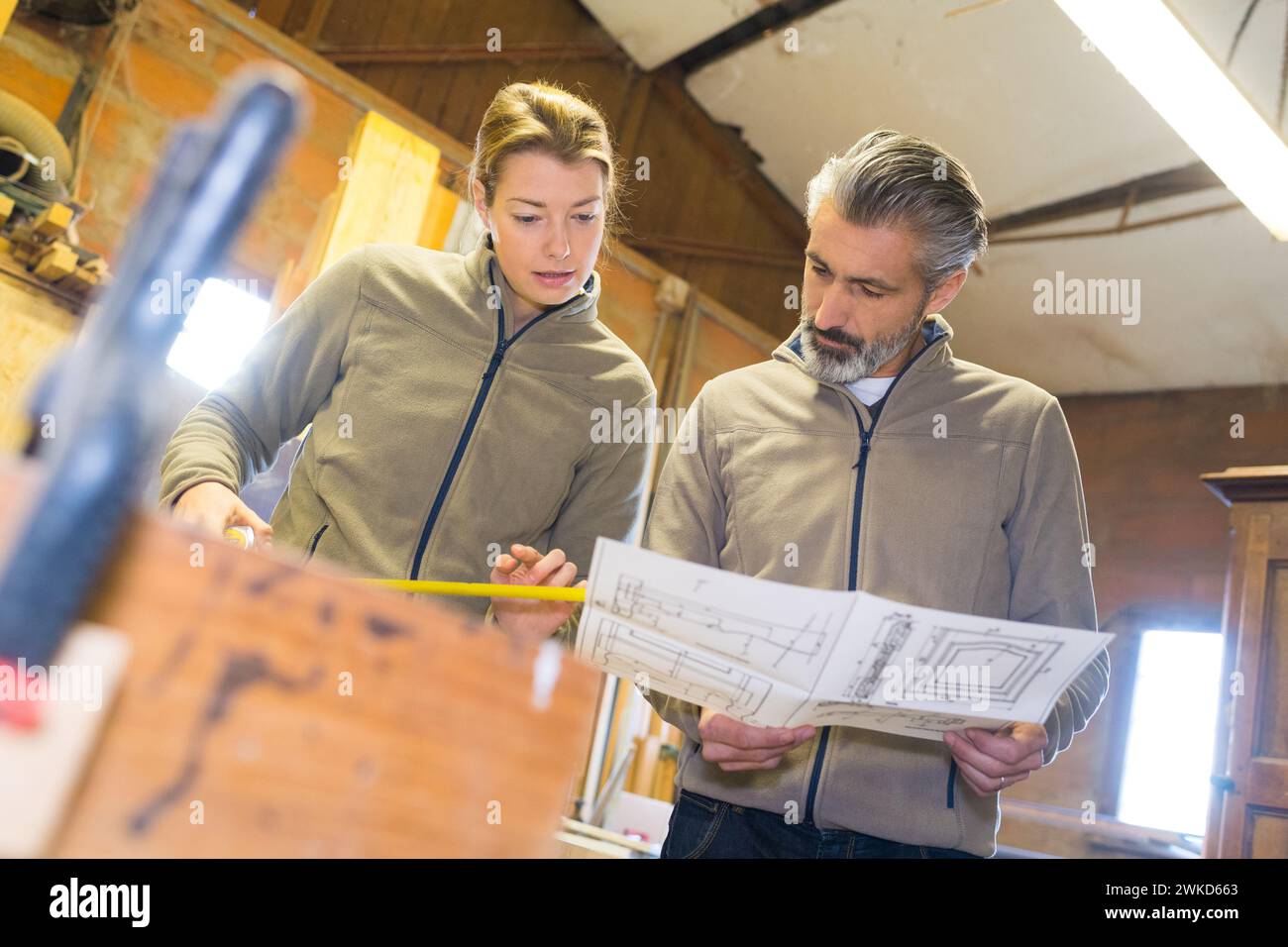 carpenters team planning and working together Stock Photo - Alamy