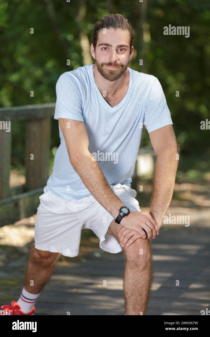 Man one leg up one arm up hi-res stock photography and images - Alamy