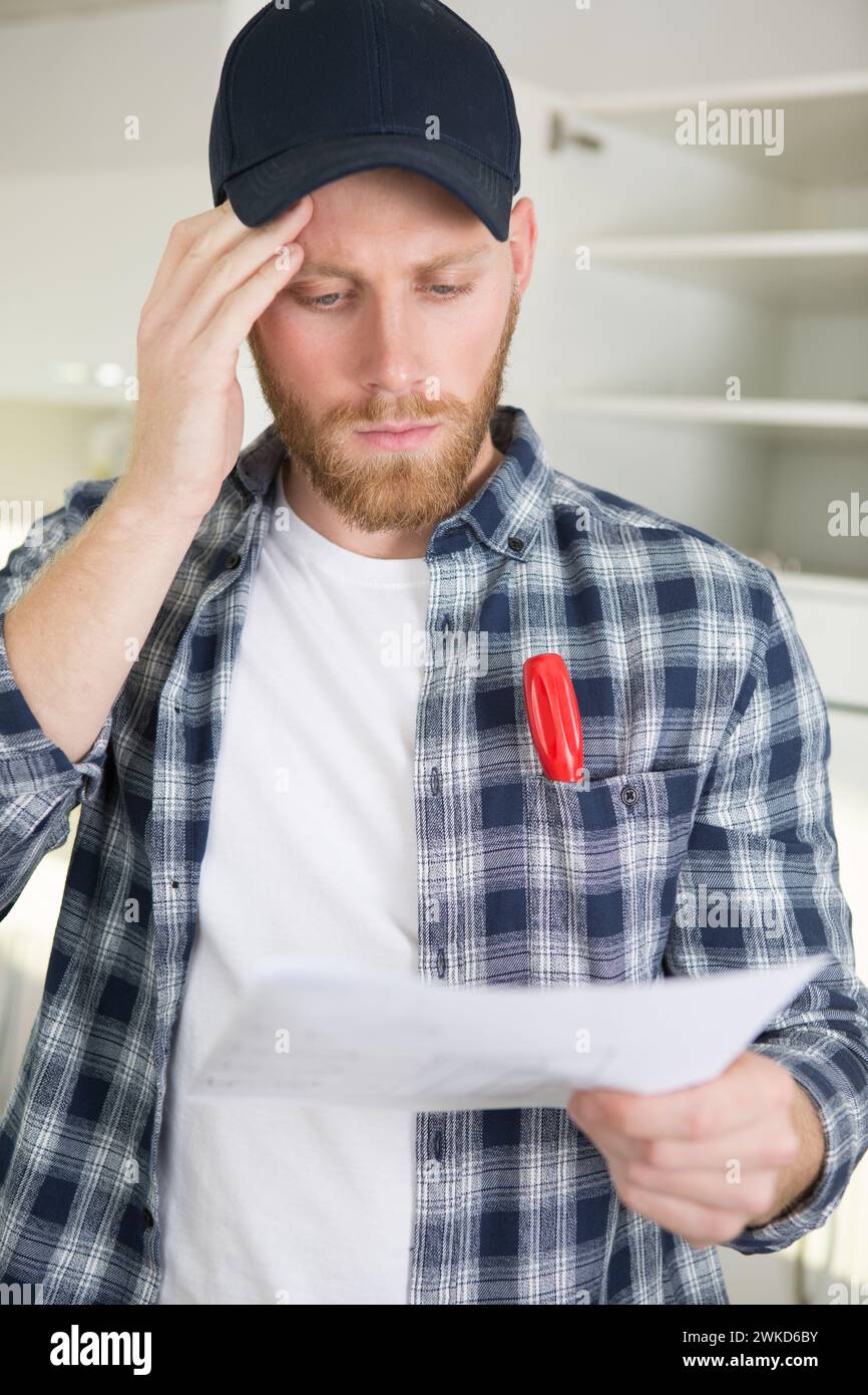 male worker reading a manual Stock Photo - Alamy male worker reading a manual Stock Photo - Alamy