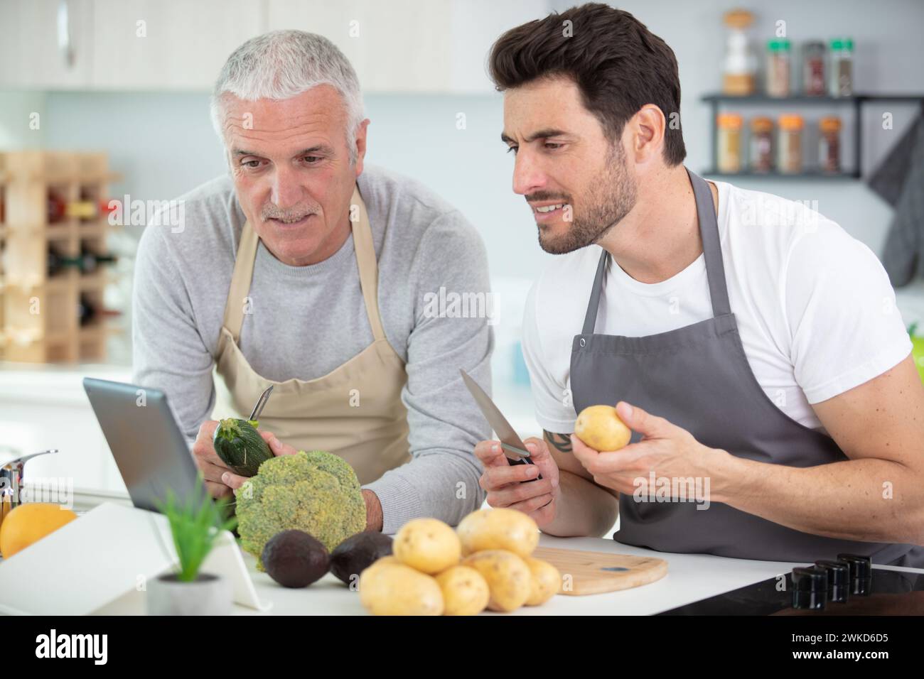 Men following instructions hi-res stock photography and images - Alamy