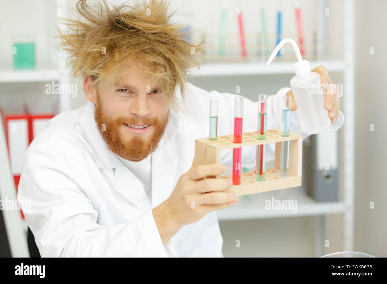 Scientist in robe rubber gloves hi-res stock photography and images - Alamy