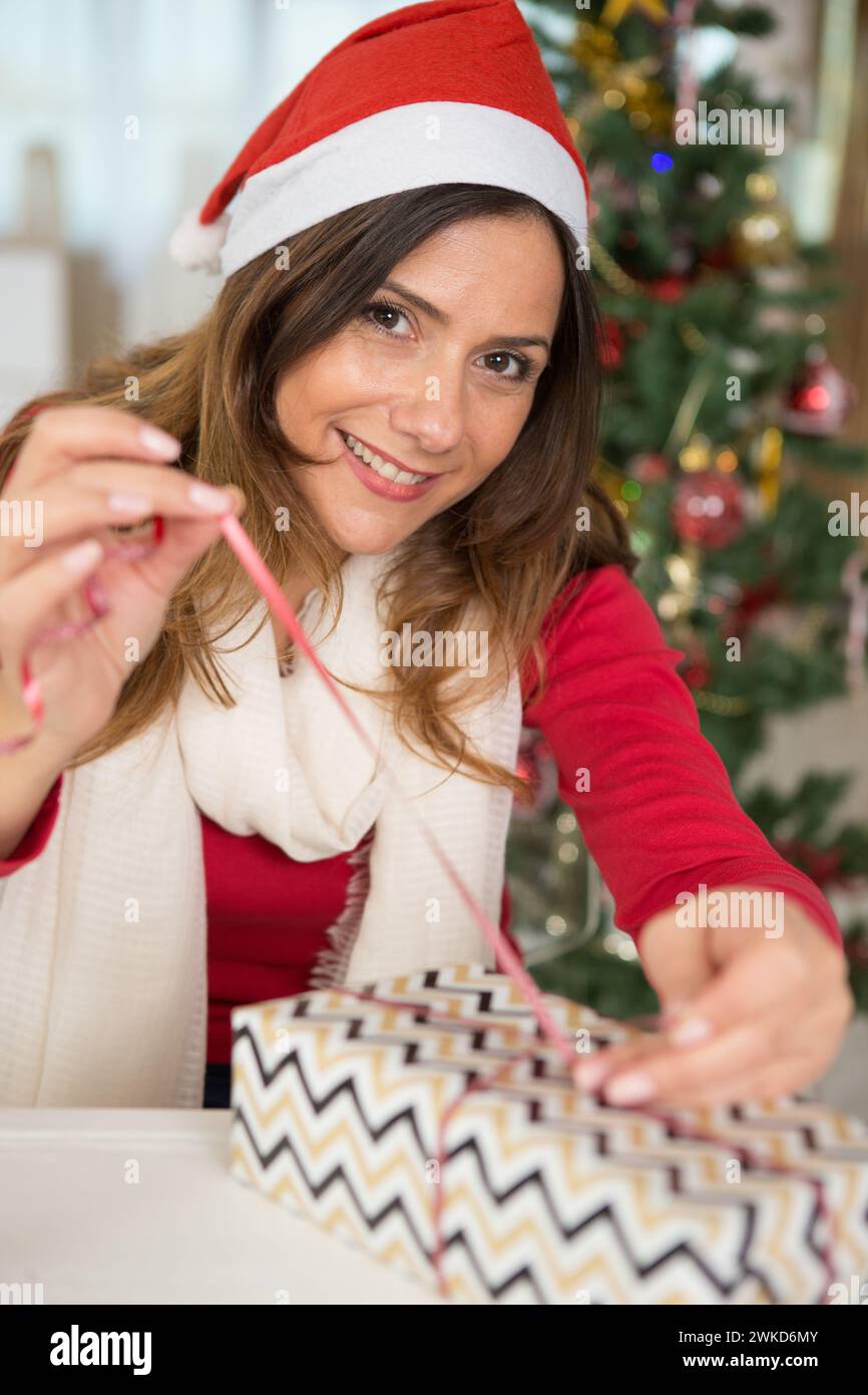 Woman body red christmas bow hi-res stock photography and images - Alamy