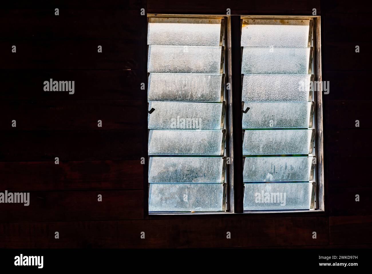 Silhouetted louvered glass windows hi-res stock photography and images ...