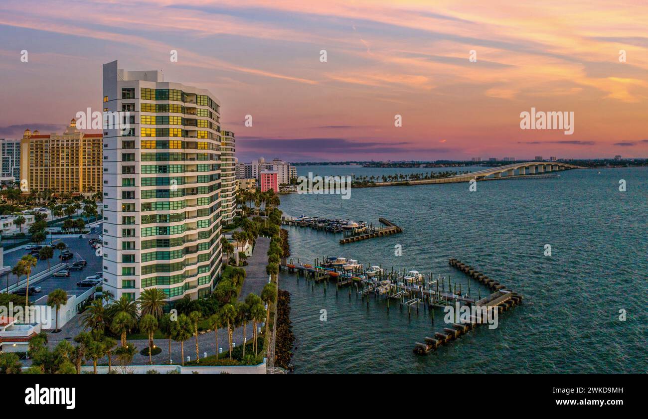 Scenic sunset over marina pier with cloudy sky above Stock Photo - Alamy