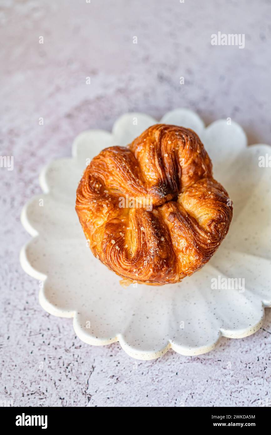 Kouign-amann is a sweet Breton cake made with laminated dough. It is a ...