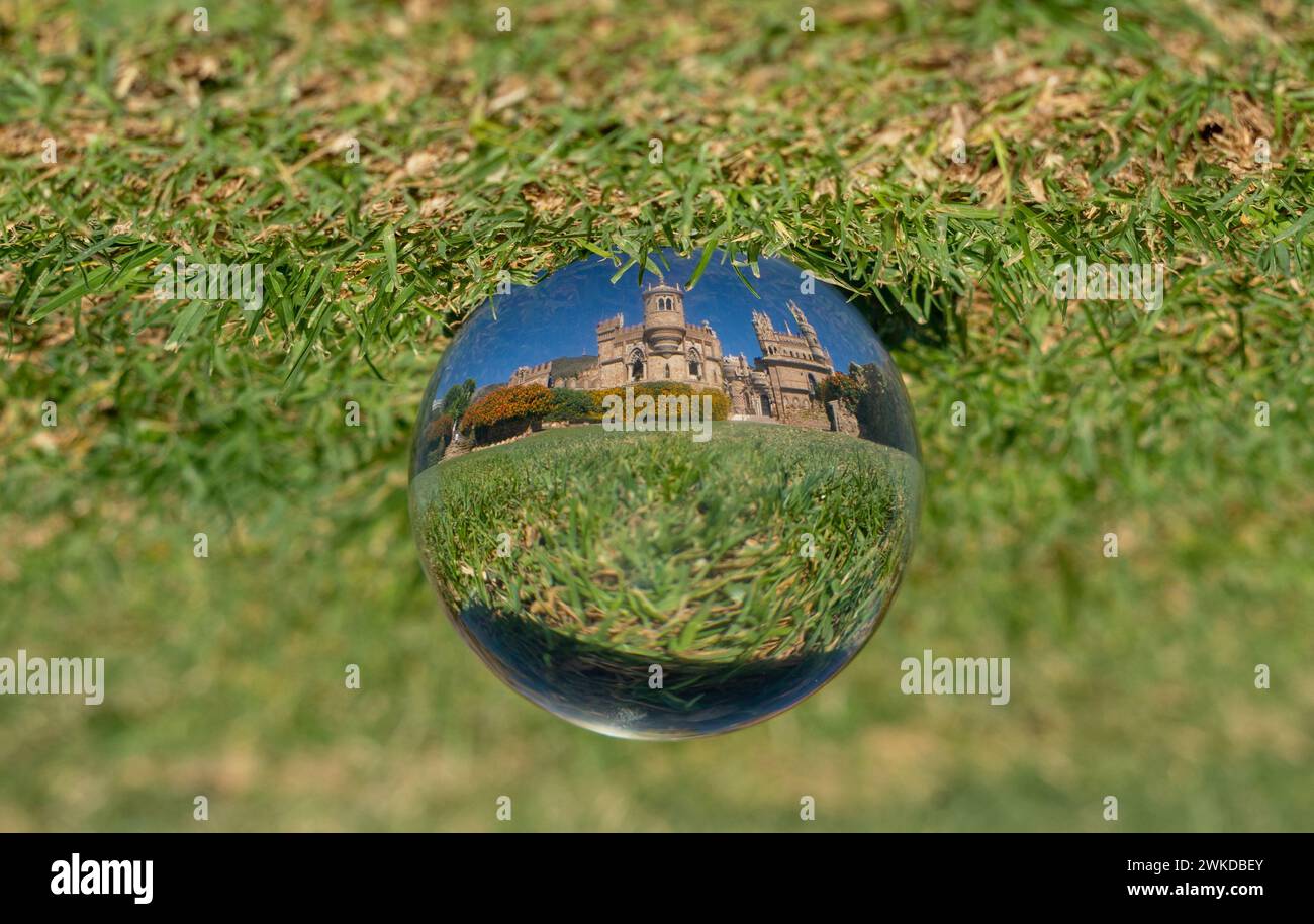 Glass sphere reflecting the castle of Colomares in different medieval ...