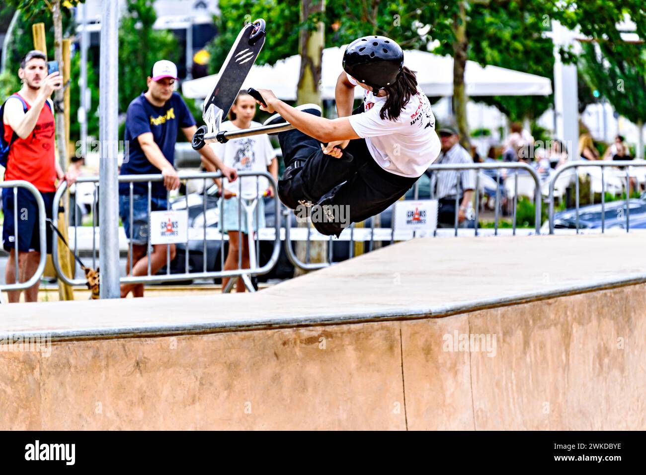 Igualada, Barcelona; July 16, 2023: Young man practicing Scootering ...