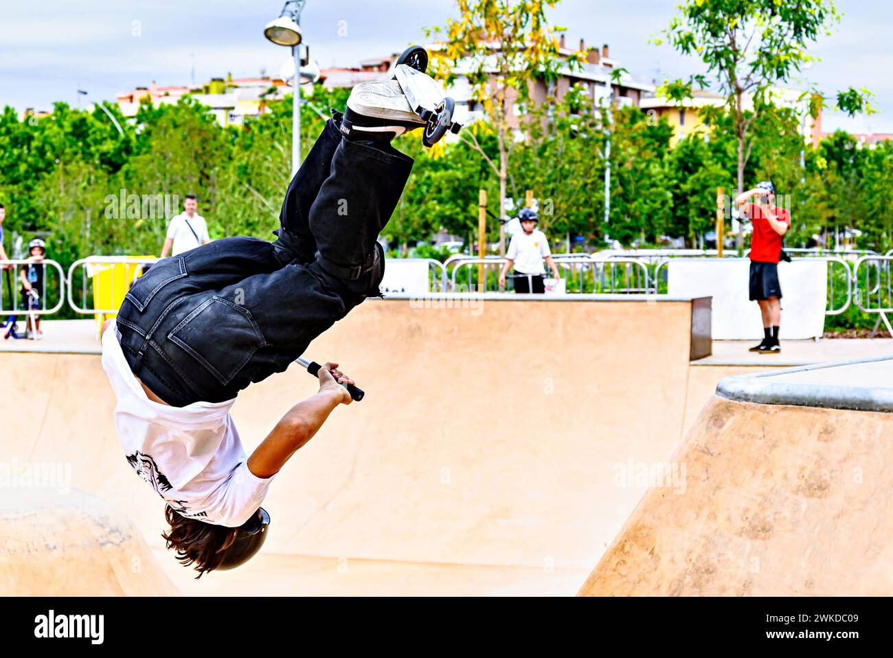 Igualada, Barcelona; July 16, 2023: Young man practicing Scootering ...