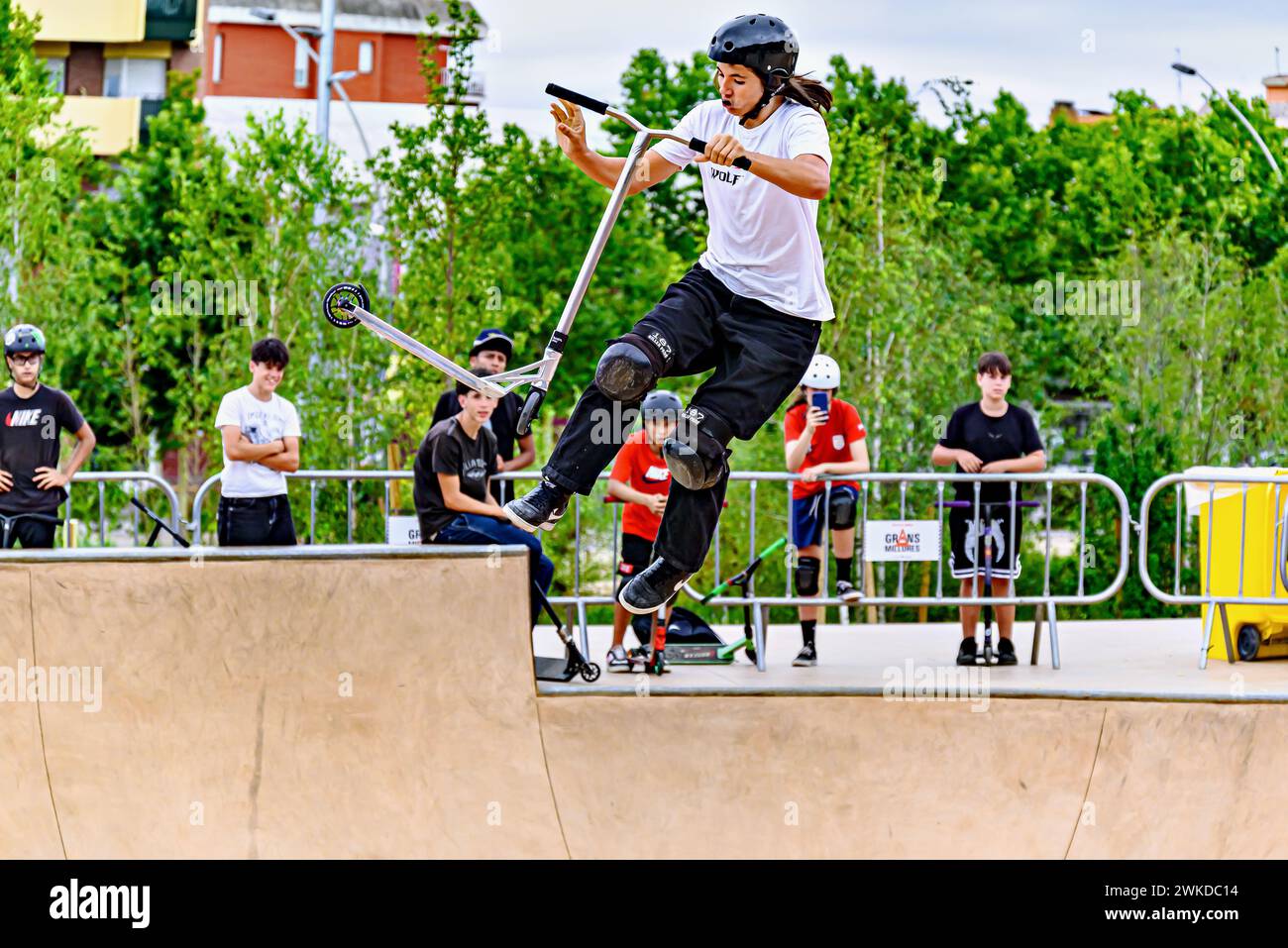 Igualada, Barcelona; July 16, 2023: Young man practicing Scootering ...