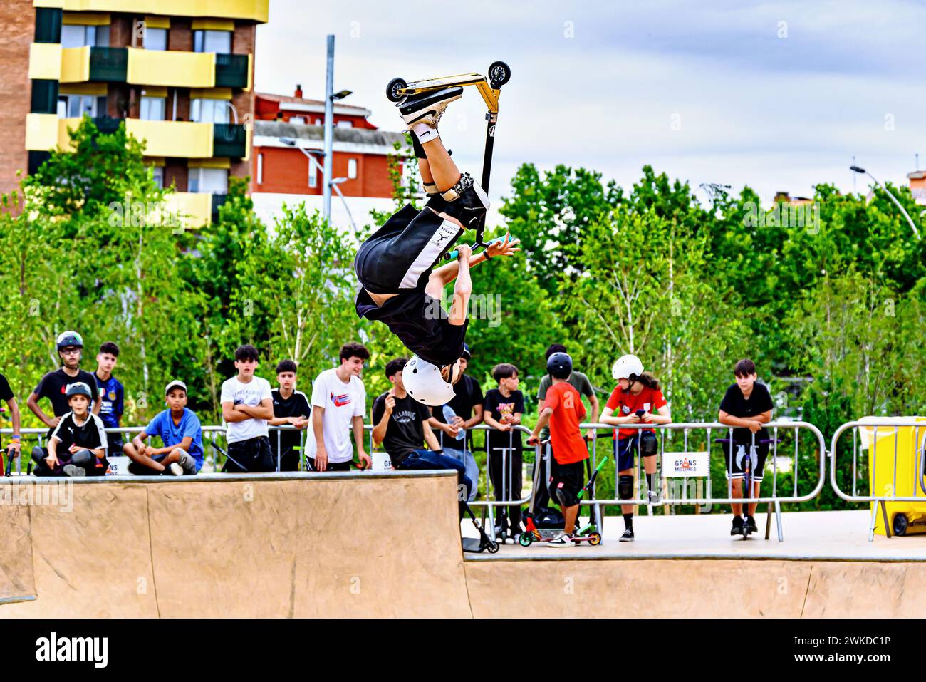 Igualada, Barcelona; July 16, 2023: Young man practicing Scootering ...