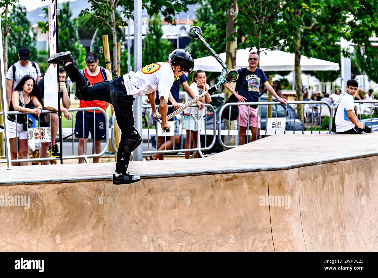 Igualada, Barcelona; July 16, 2023: Young man practicing Scootering ...