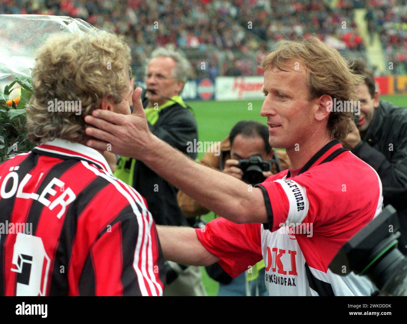 Leverkusen's Rudi Voeller, left, and Kaiserslautern's Andreas Brehme on ...
