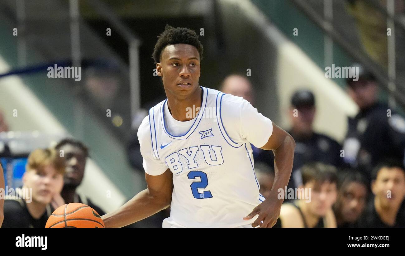 BYU guard Jaxson Robinson (2) brings the ball up court during the ...