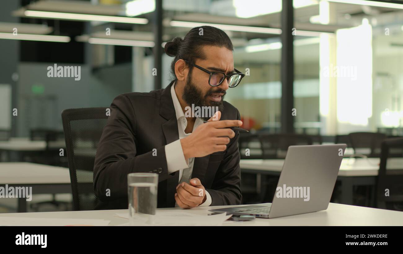 Stressed angry mad aggressive Indian male employer leader Arabian ...