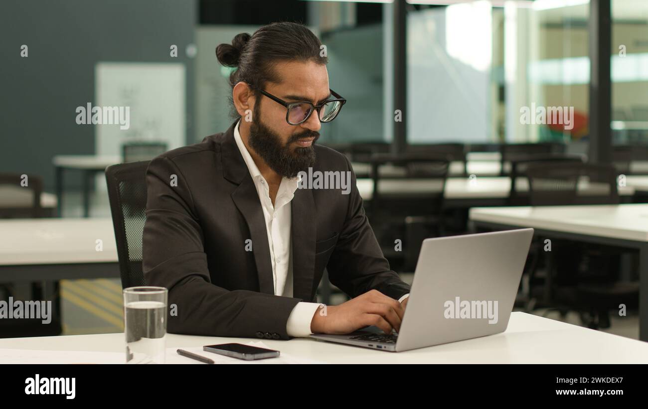 Busy concentrated Indian male employer company corporate Arabian ...