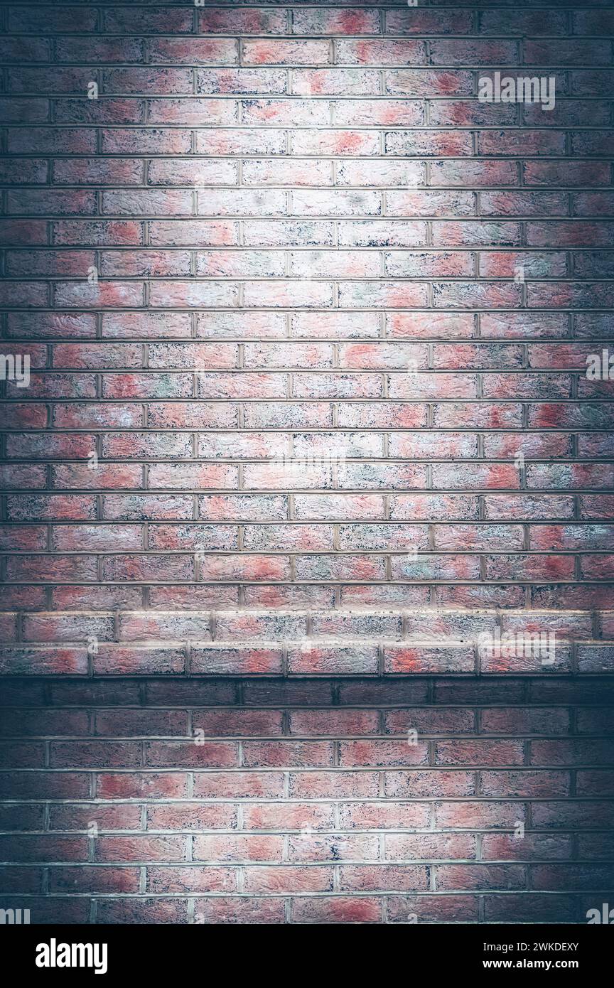 Spotlight on a brick wall. background with brick wall and spotlight ...