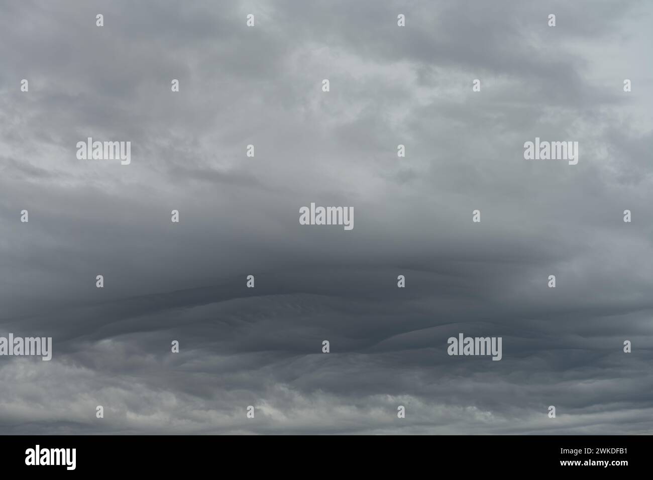 Expansive asperitas clouds form a dramatic wave-like pattern across the ...