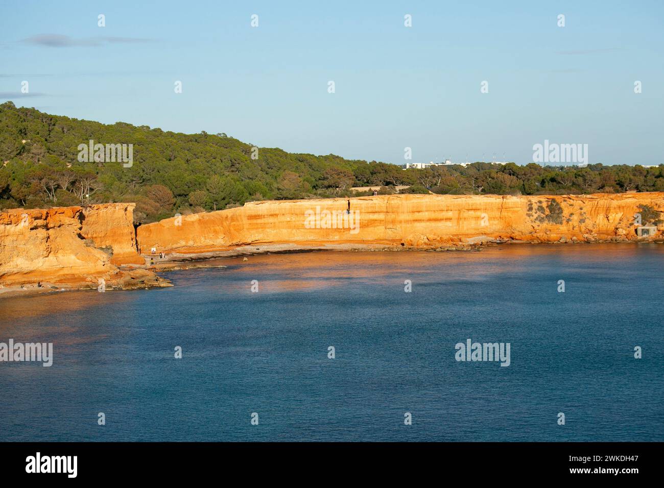 Sa Caleta beach in Ibiza. Beautiful beach with reddish rock and crystal ...