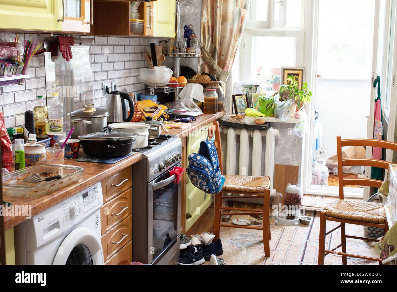 Interior of a small kitchen with a lot of things and clutter Stock ...