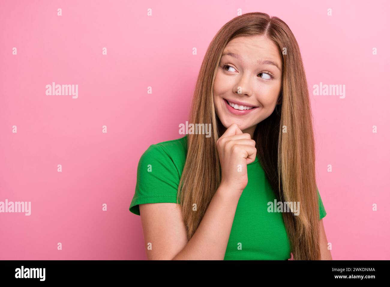 Photo portrait of charming teen girl look interested empty space wear ...