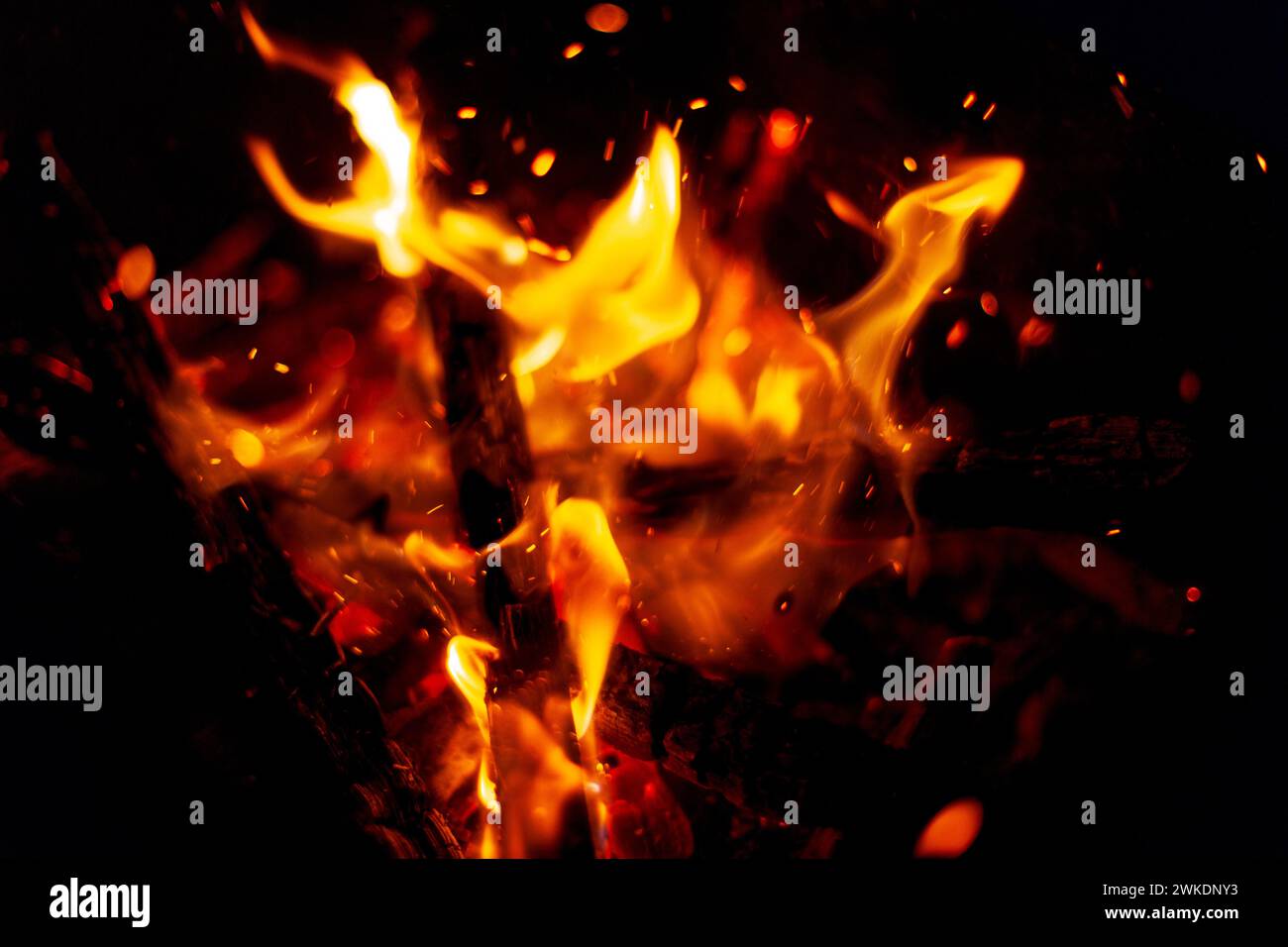 Amazing fire with sparks at night. Bonfire Stock Photo - Alamy