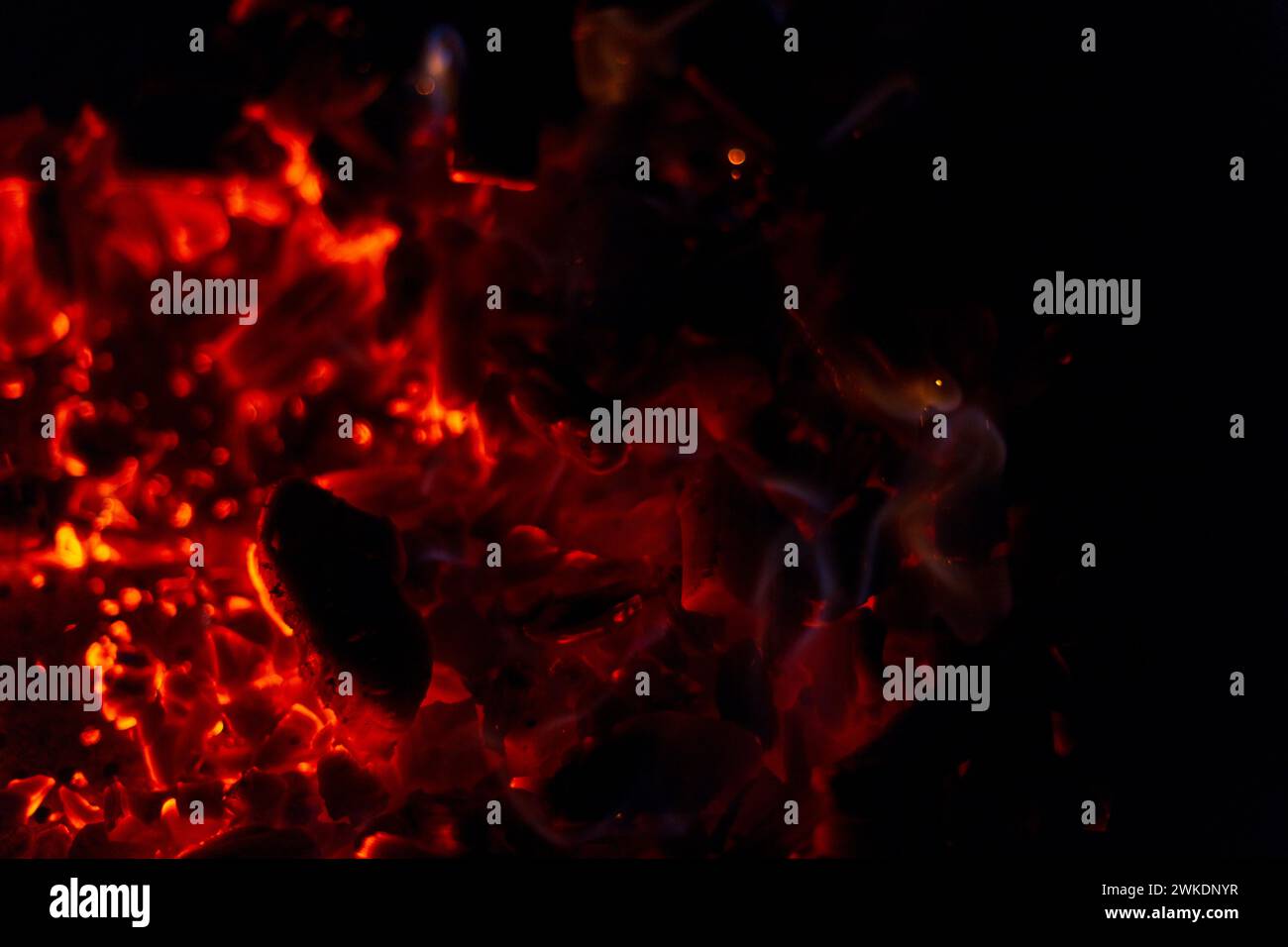 Burning coals in the dark. An extinct bonfire, Fire Stock Photo - Alamy