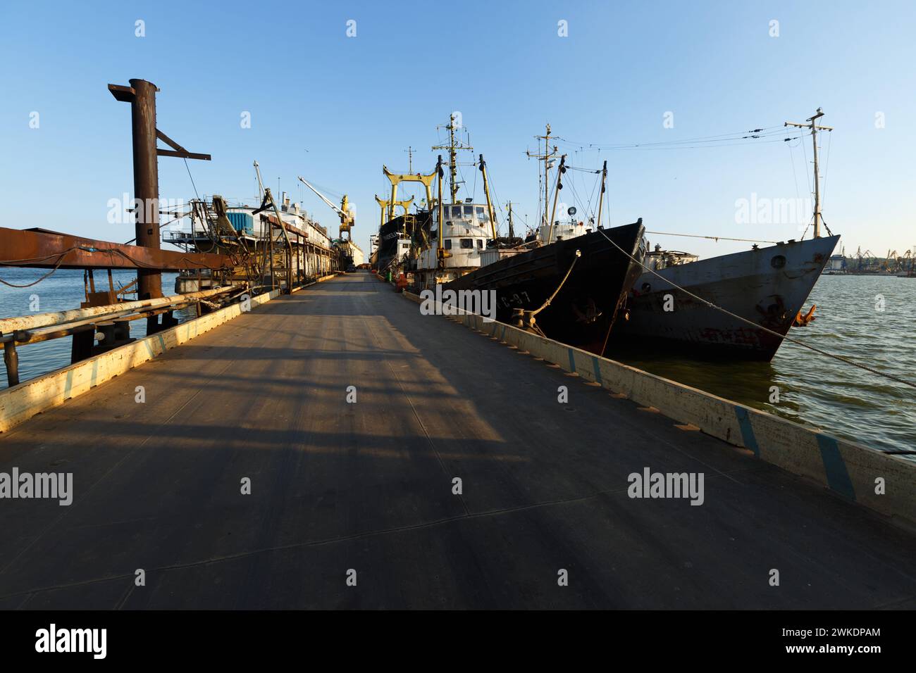 Floating pontoon bridge at shipyard, maintenance of marine vessels ...