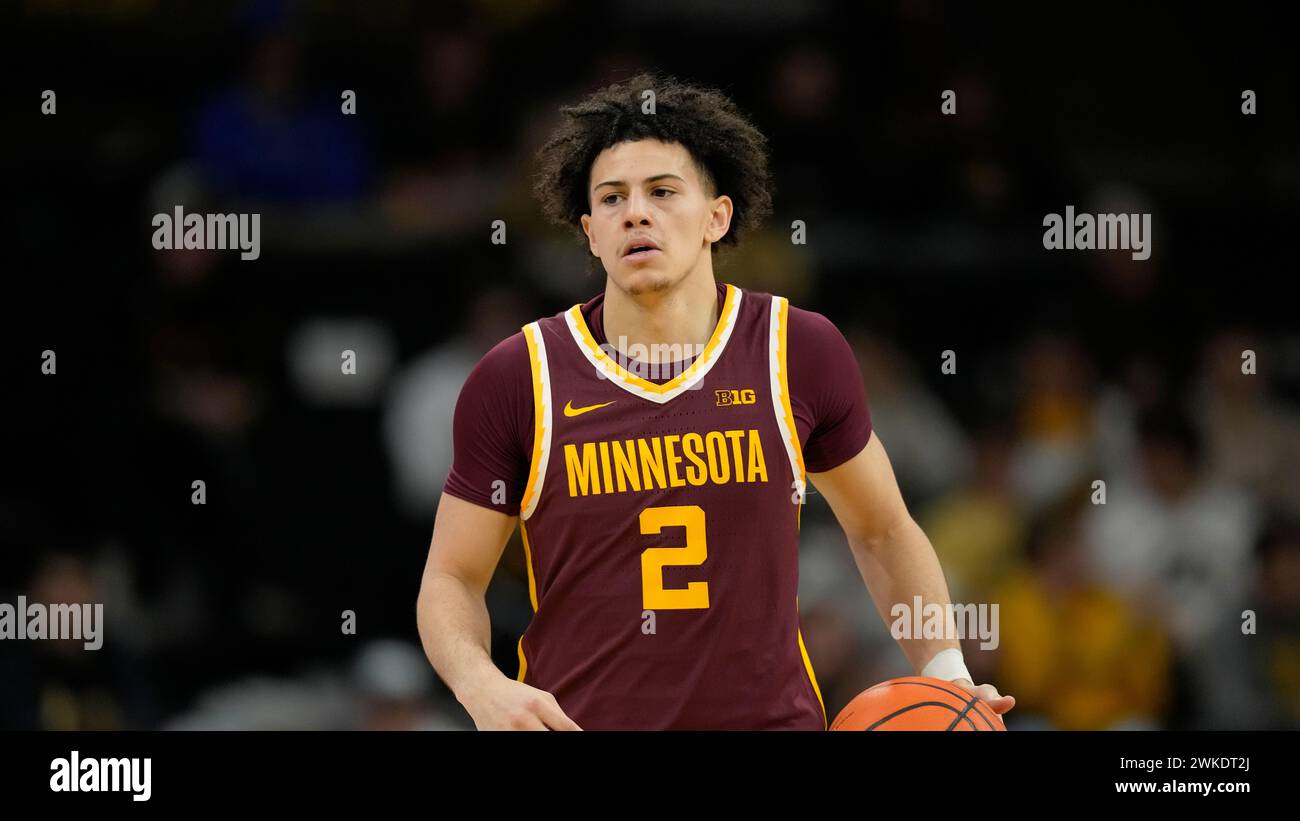 Minnesota guard Mike Mitchell Jr. (2) drives up court during the first ...
